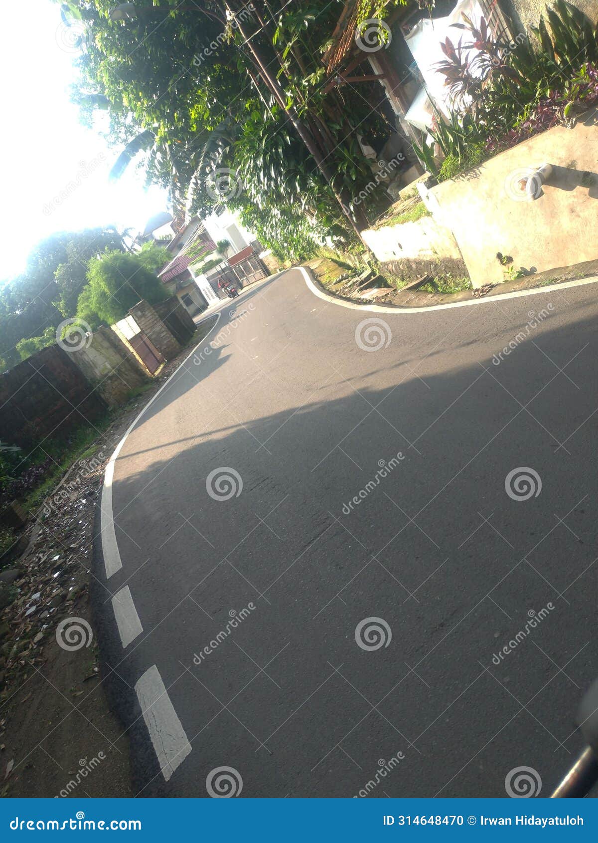 The Road Takes a Sharp Turn in the Village Stock Photo - Image of ...