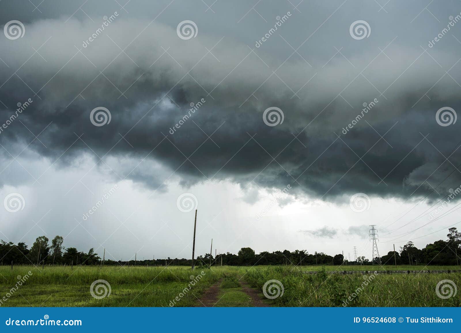 The Road To the Field with the Rain Clouds are Falling Stock Photo ...