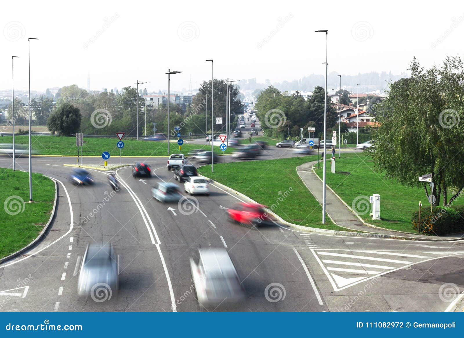 Car Traffic Around the Roundabout Stock Photo - Image of roundabout ...