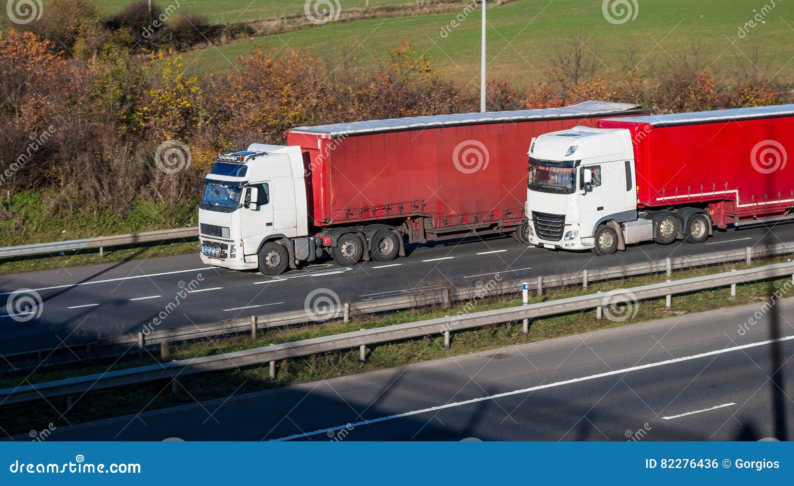 Road Transport - Two Lorries on the Motorway Stock Photo - Image of ...