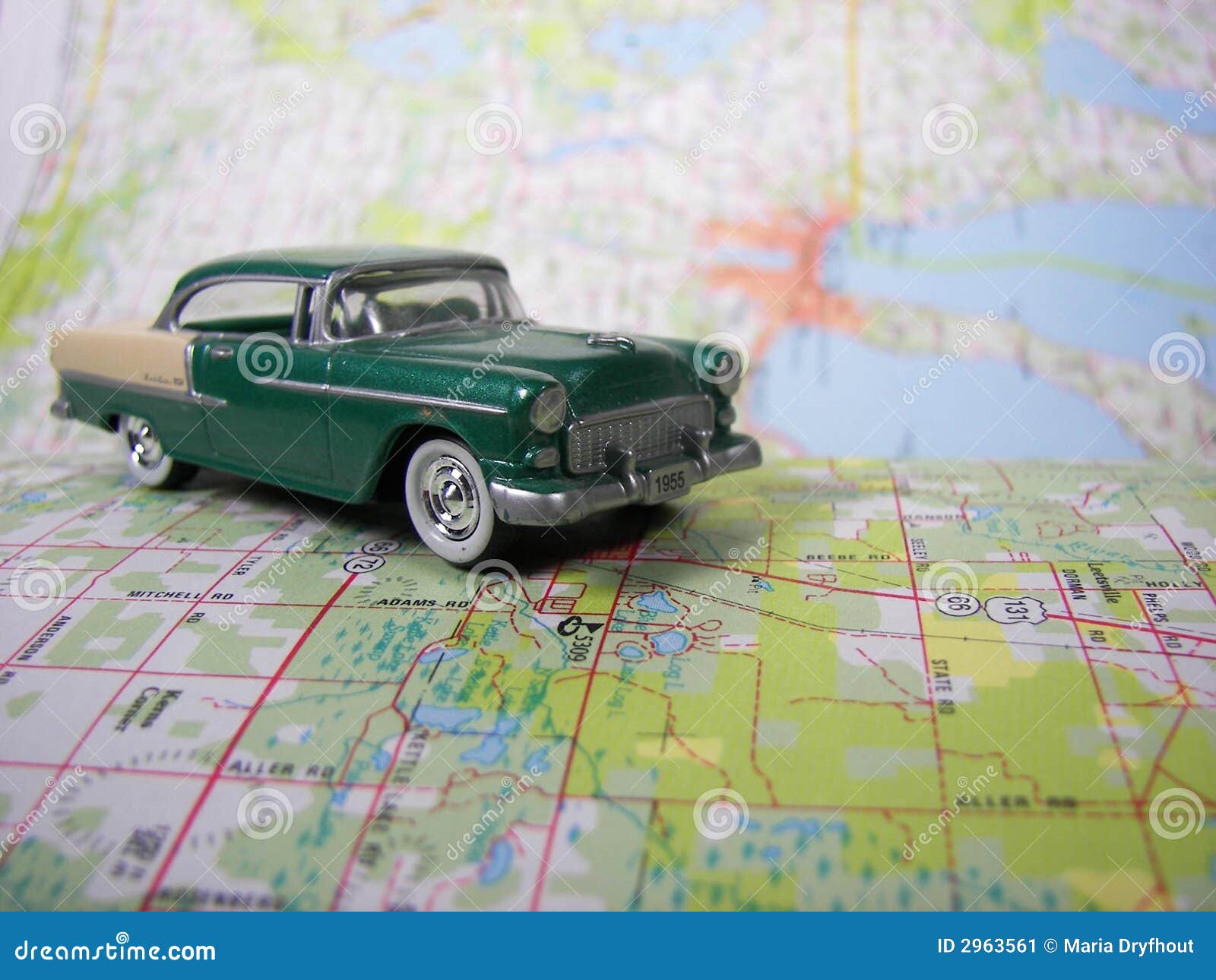 Vintage car on road map stock image. Image of atlas, location - 2963561
