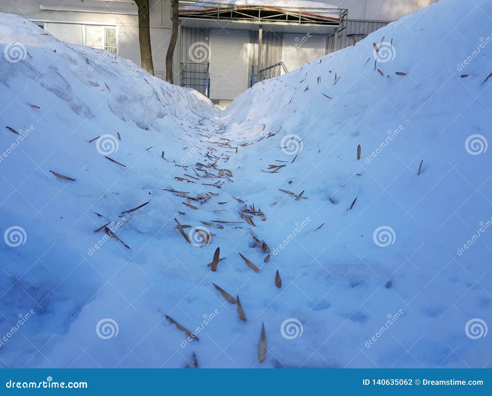 Road and Trodden Path in the Snow Stock Photo - Image of footprints ...