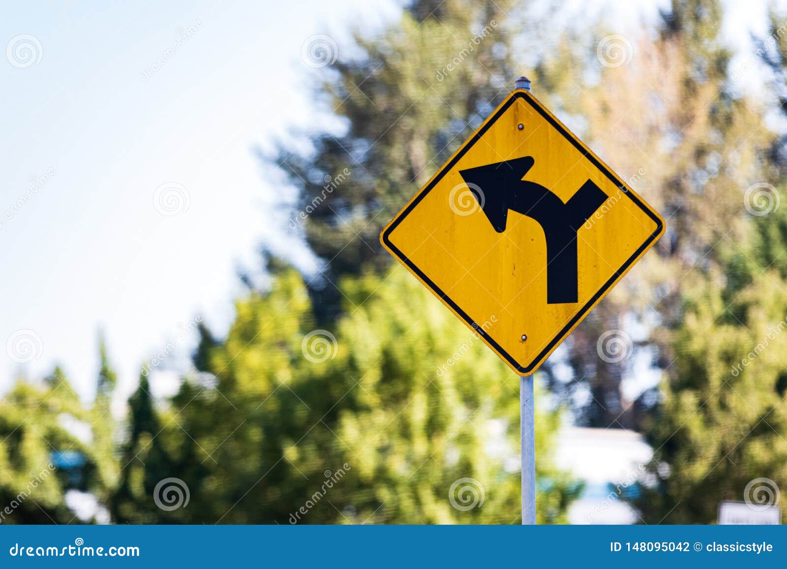 Road Turns Directional Street Sign with Trees Stock Photo - Image of ...