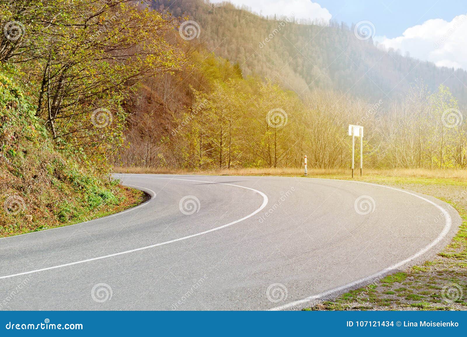 The Road Turns To the Left among the Small Mountains and Forests ...