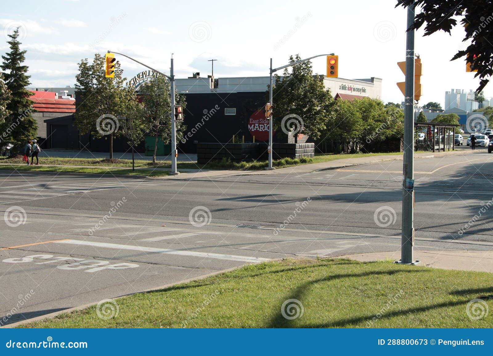 Road with Two Parking Lot Exit Entrances with Lights. P Editorial Stock ...