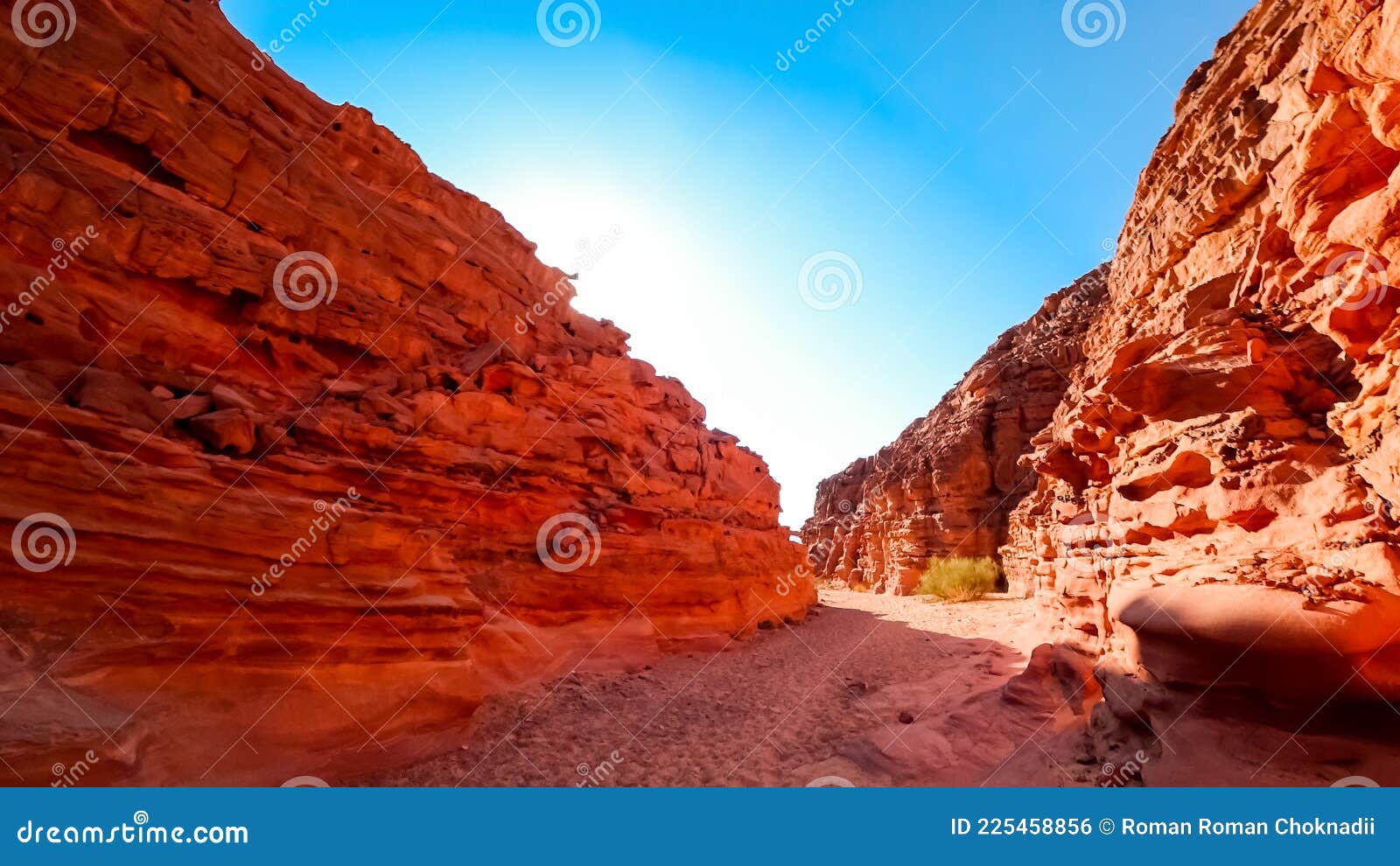 Road between Two Red Rocks Located in the Desert Stock Photo - Image of ...