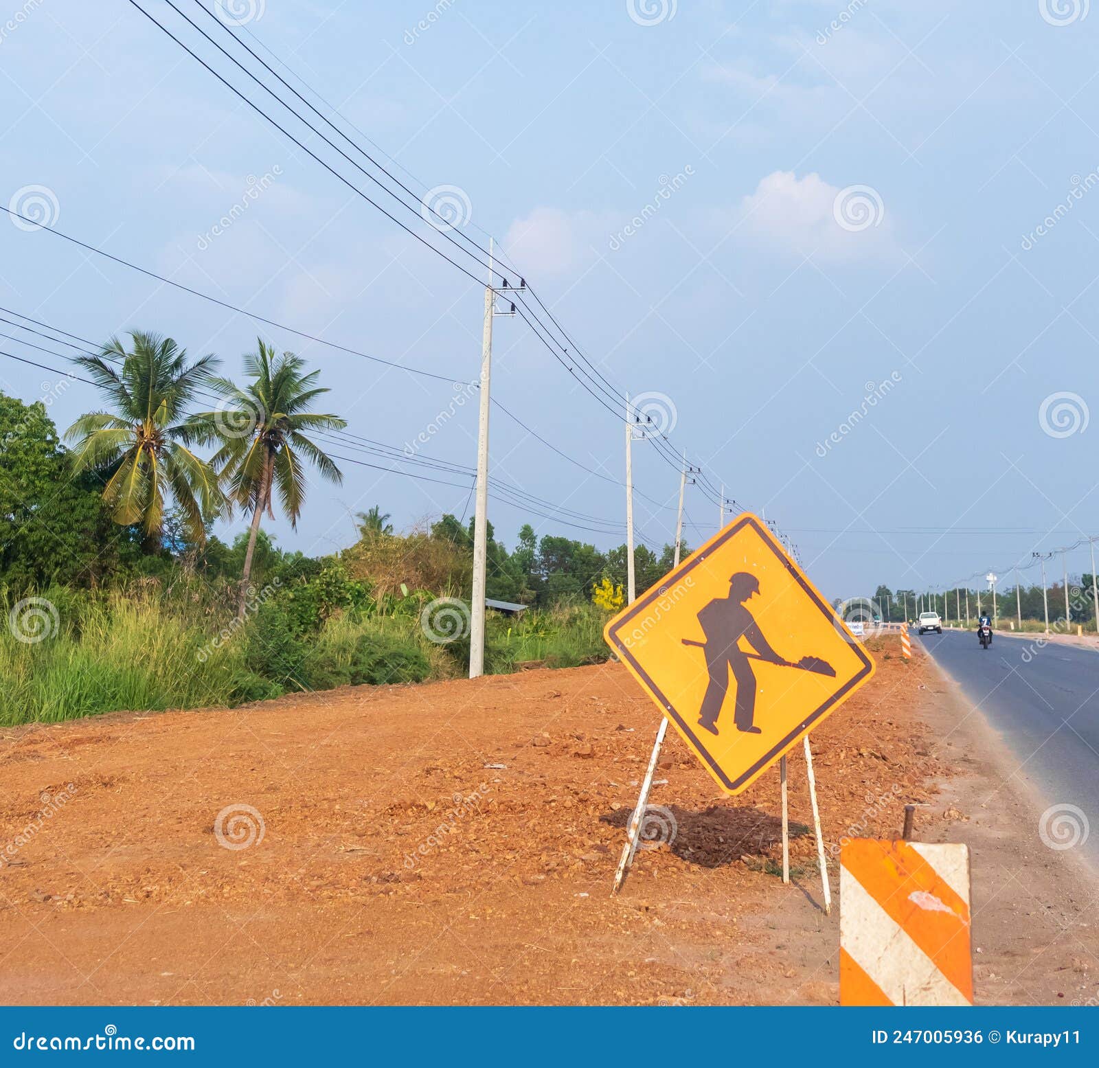 Road Under Construction and There is a Road Warning Sign Stock Photo ...