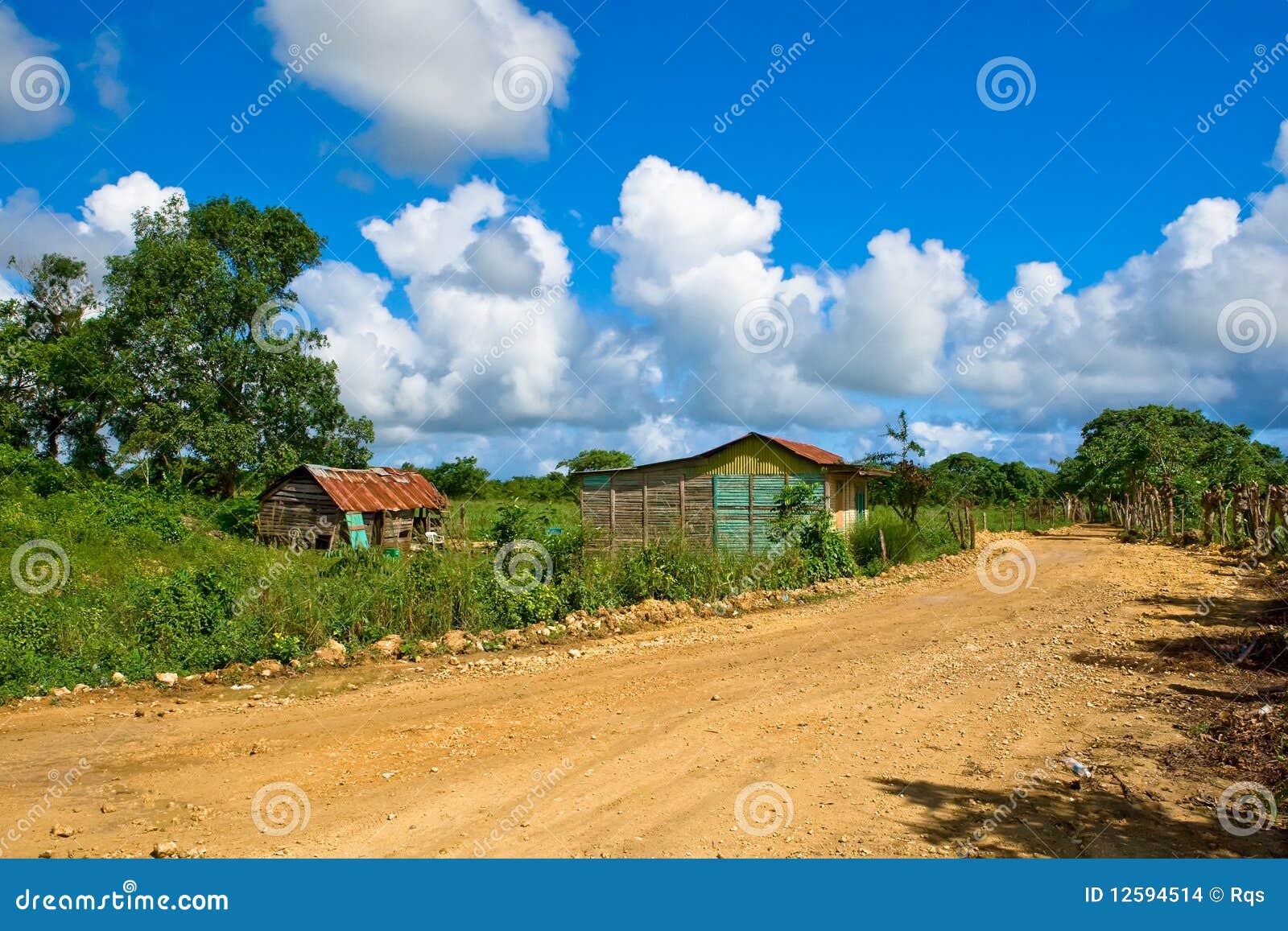 Road in the Village Under Blue Sky Stock Photo - Image of blue, sunny ...