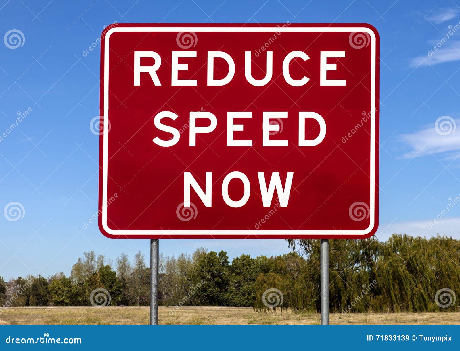 Road Warning Sign - Reduce Speed Now Stock Image - Image of ...