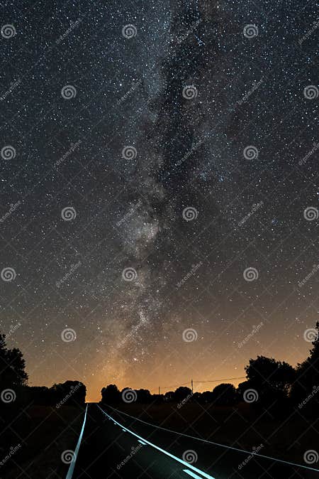 Road with White Lines Under the Milky Way Stock Photo - Image of night ...