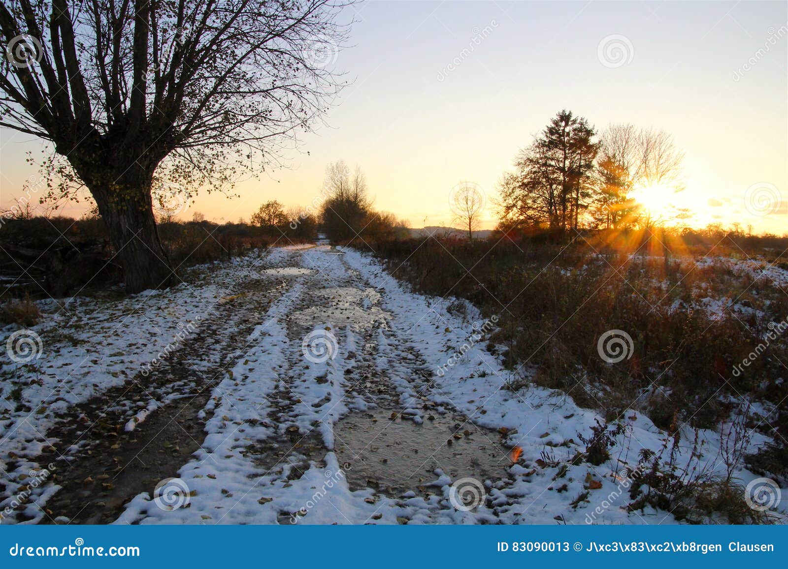 The road in winter terrain stock image. Image of reddish - 83090013