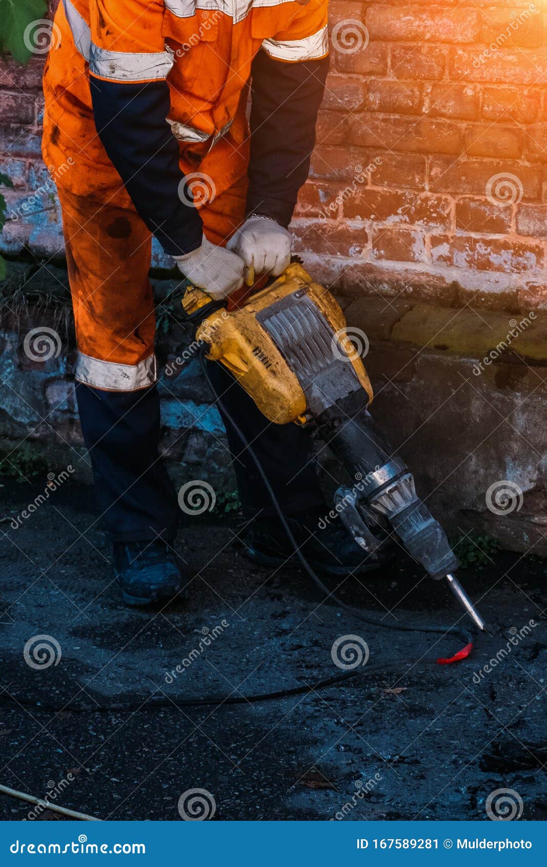 Road Worker Drilling Asphalt on Pavement with Jackhammer Stock Image ...