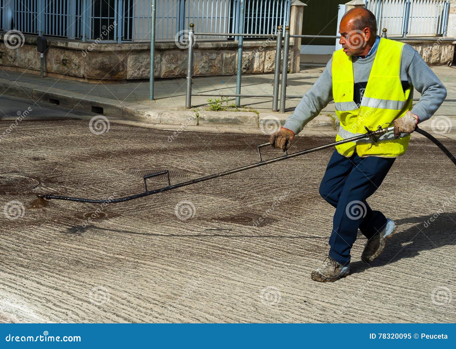Road Worker Spraying Bitumen Emulsion Stock Image - Image of ...