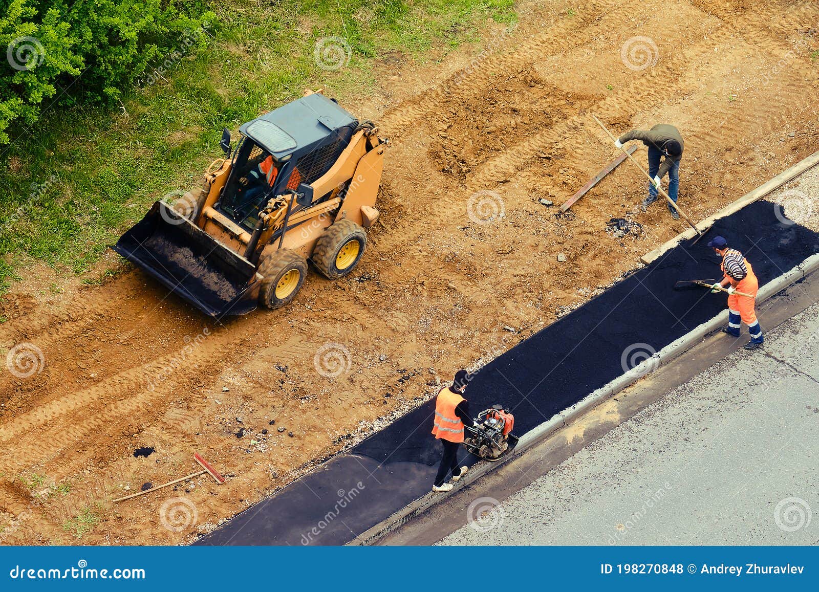 A Worker Using A Telescopic Forklift Raises A Load Of Bricks During ...