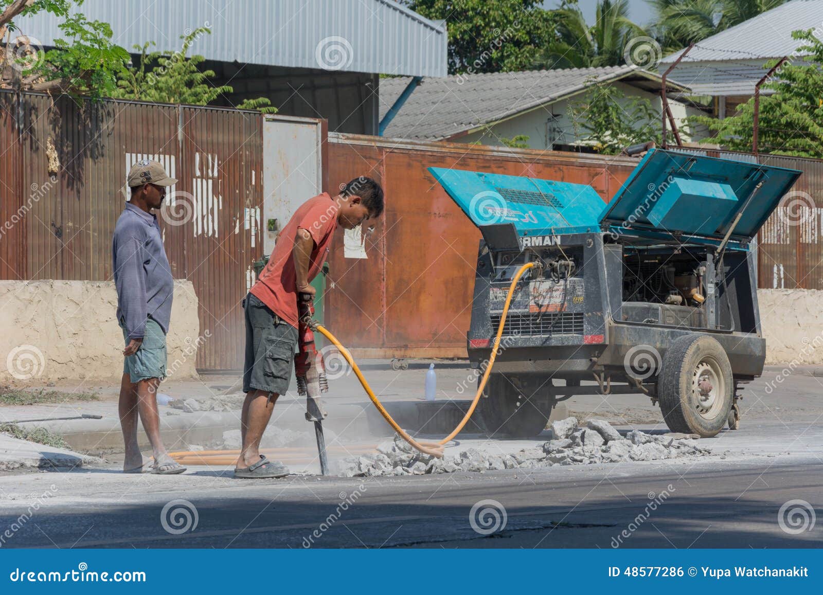 Road Workers Breaking Street Editorial Photo - Image of equipment ...