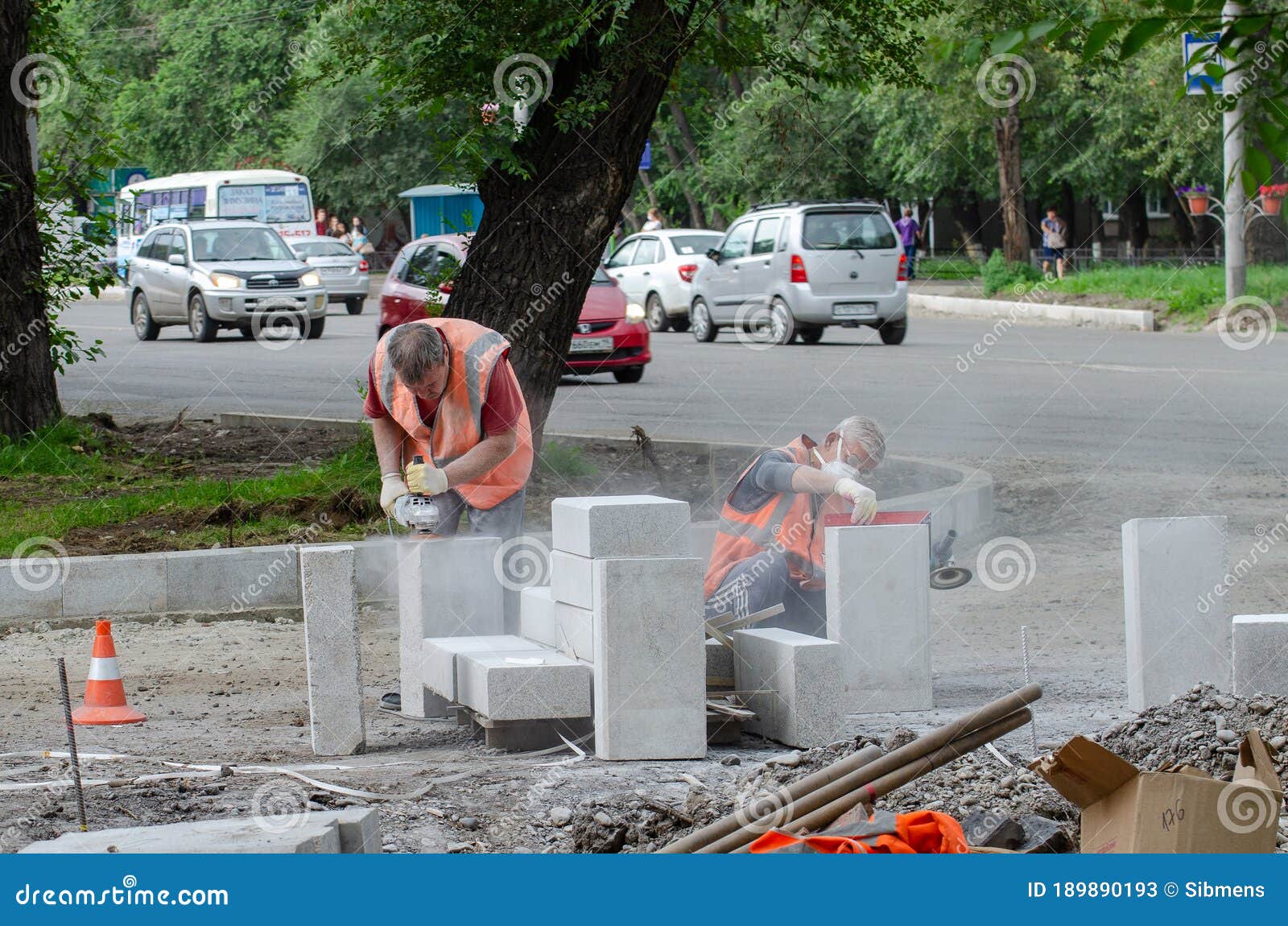 Road Workers Process and Stack a New Curbstone on the Roadway Editorial ...