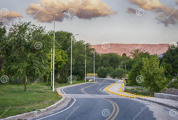 A Road with a Yellow Line Down the Middle Stock Photo - Image of summer ...