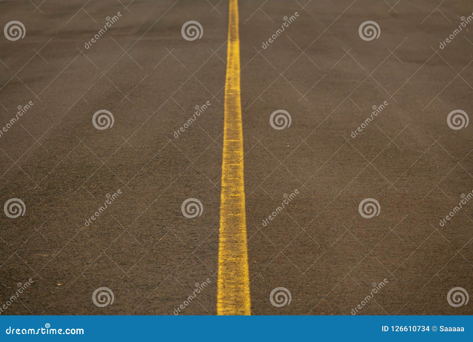 Road with Yellow Line in the Middle Stock Photo - Image of closeup ...