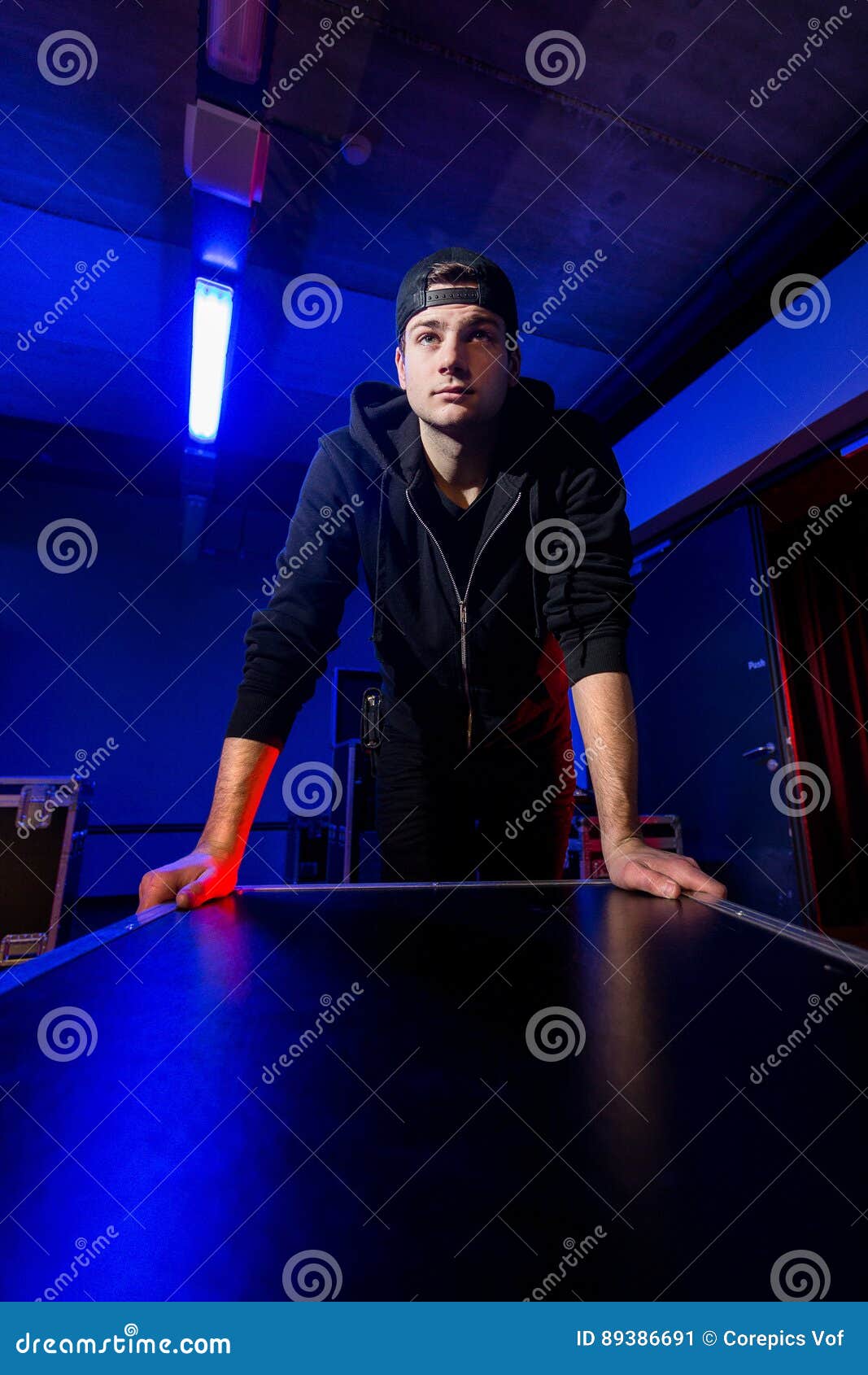 Roadie Rolling a Flightcase Back Stage Stock Image - Image of helpful ...