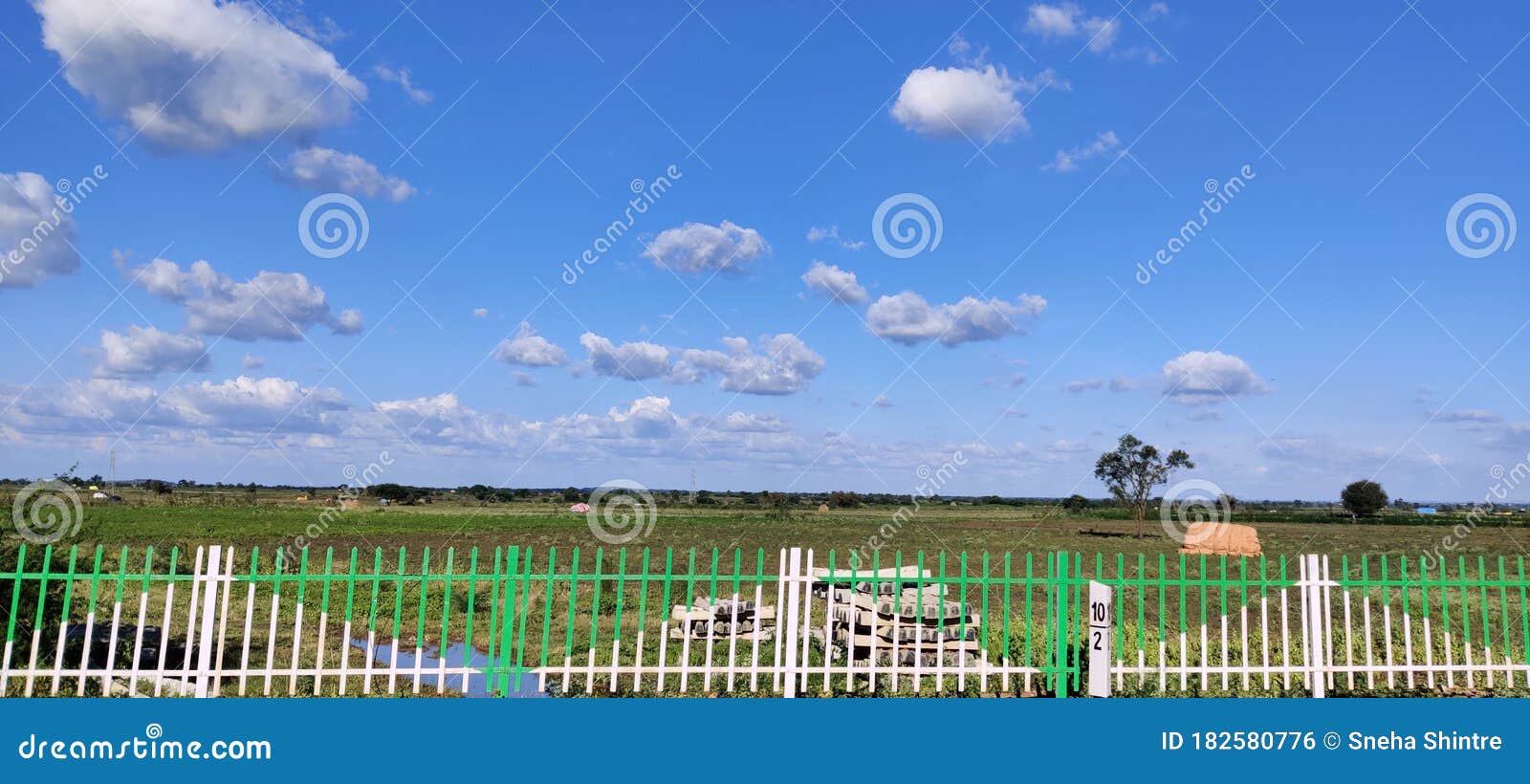 Roadside Green Farms and Barrier Stock Photo - Image of lawn ...