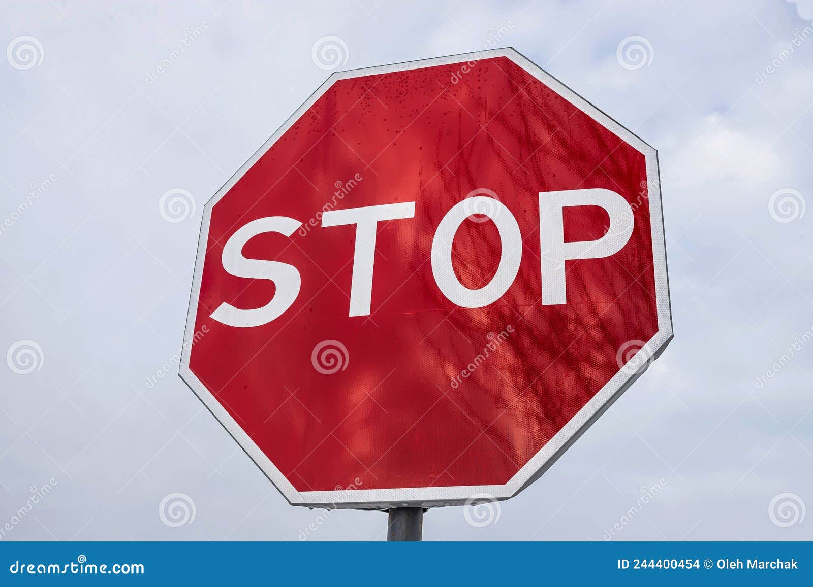 Roadside Red Stop Sign on a Cloudy Background. Sign Isolated Stock ...