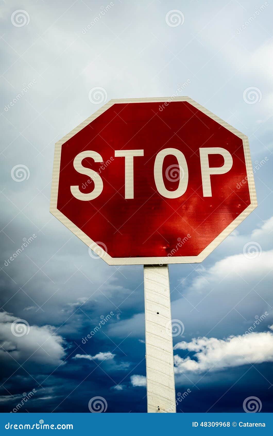Roadside Red Stop Sign on a Cloudy Background. Stock Photo - Image of ...