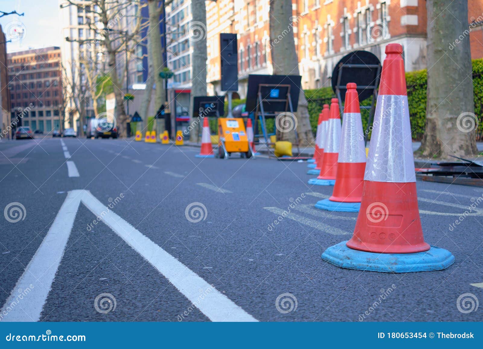Roadwork Cones on Street with Back of Temporary Traffic Lights Stock ...