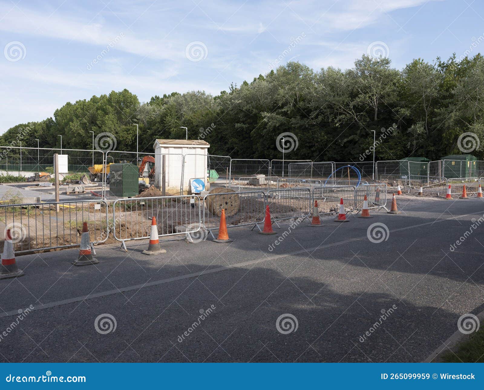 Roadworks Adjacent To Construction Site Stock Image - Image of cones ...