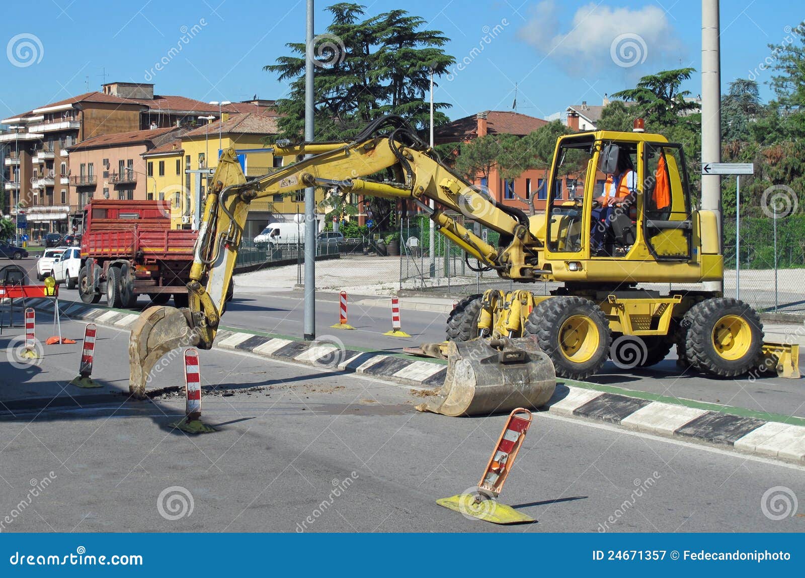 Roadworks with a Scraper To Work in the Middle of the Road Stock Image ...