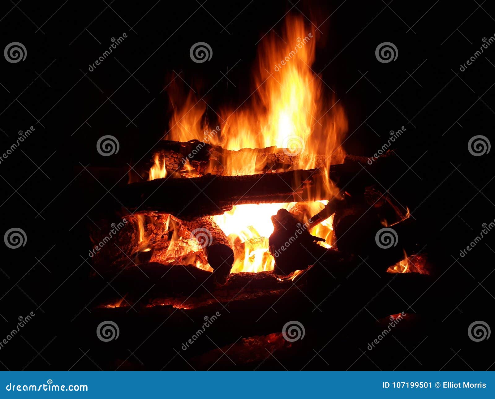 Roaring fire stock image. Image of campfire, darkness - 107199501