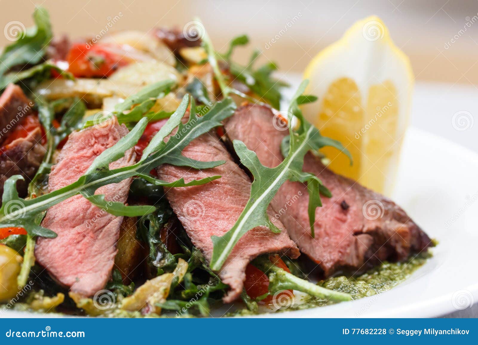 Roast Beef with Arugula, Vegetables and Lemon Stock Photo - Image of ...