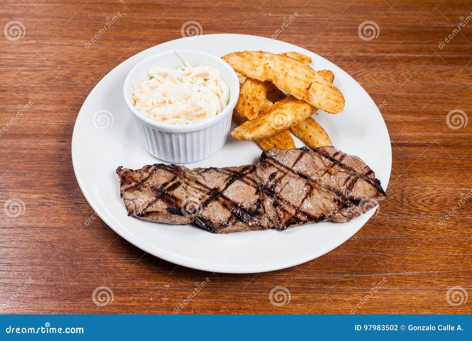 Roast Beef Fillet with a Portion Potato Chips Stock Photo - Image of ...