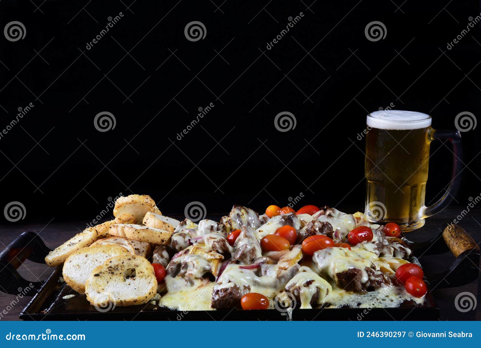 Roast Beef on Iron Plate with Cheese, Tomato Pepper Herbs, Onion ... Roast Beef on Iron Plate with Cheese, Tomato Pepper Herbs, Onion ...