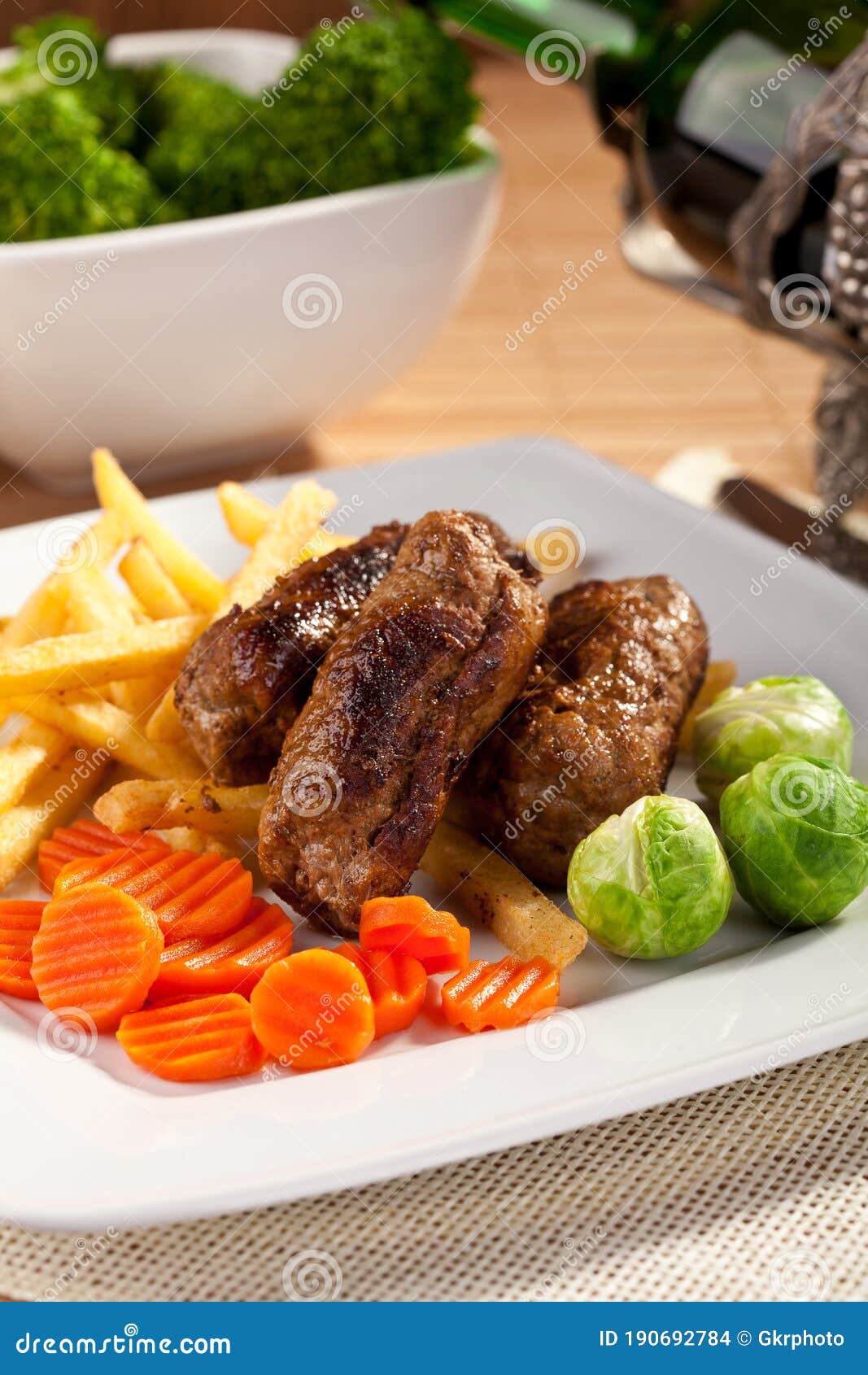 Roast Beef Rolls with Chips and Vegetables Stock Photo - Image of ...