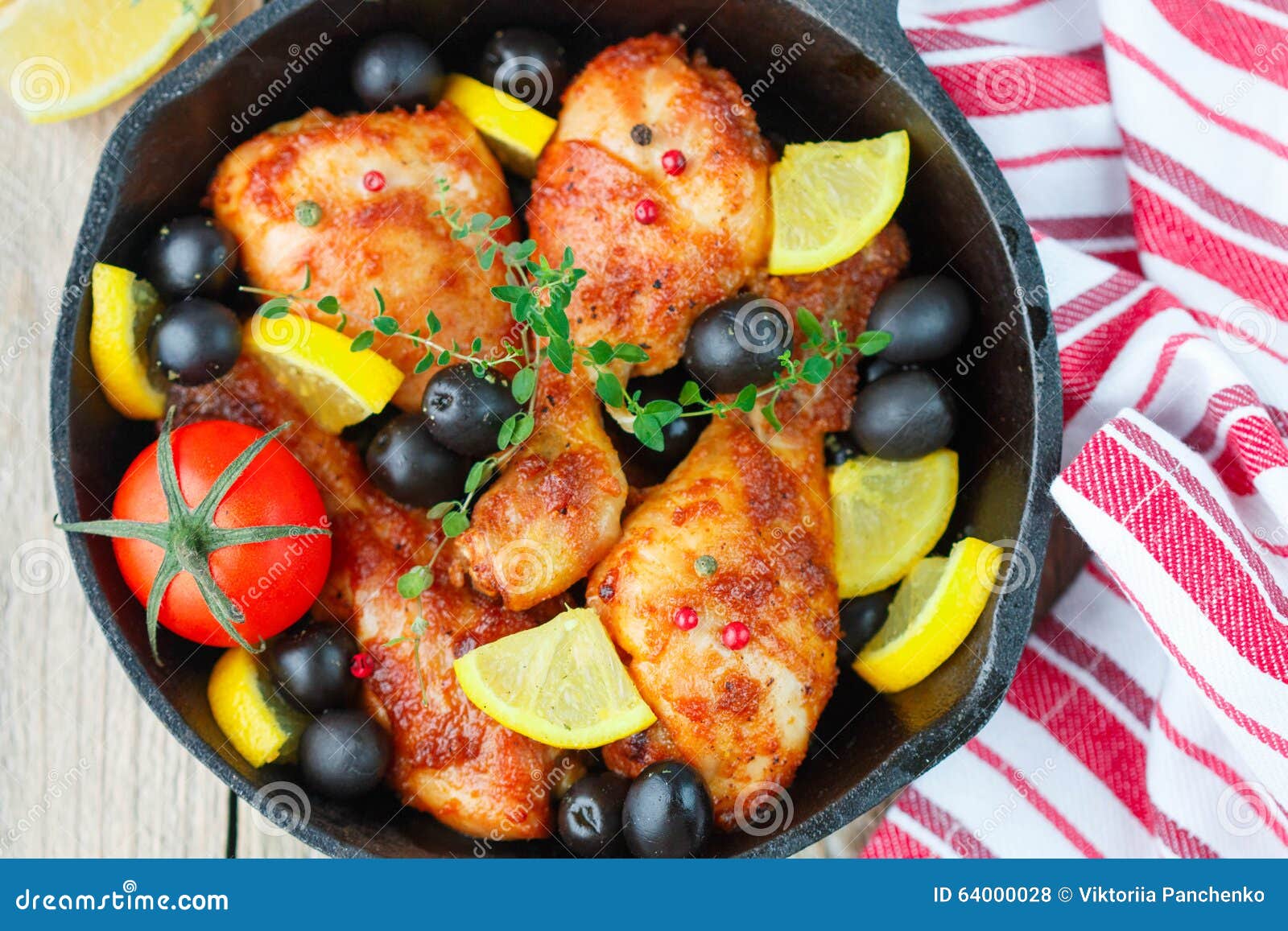 Roast Chicken with Lemon, Olives, Tomatoes and Thyme. Dinner Stock ...