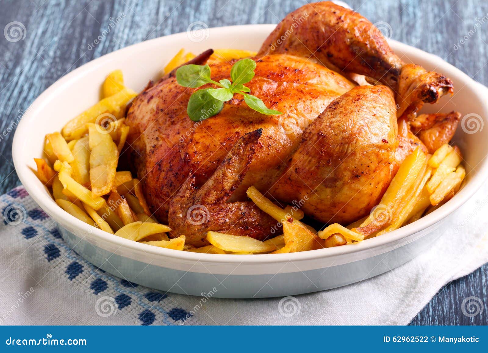 Roast Chicken and Potato Chips Stock Photo - Image of wooden, slices ...