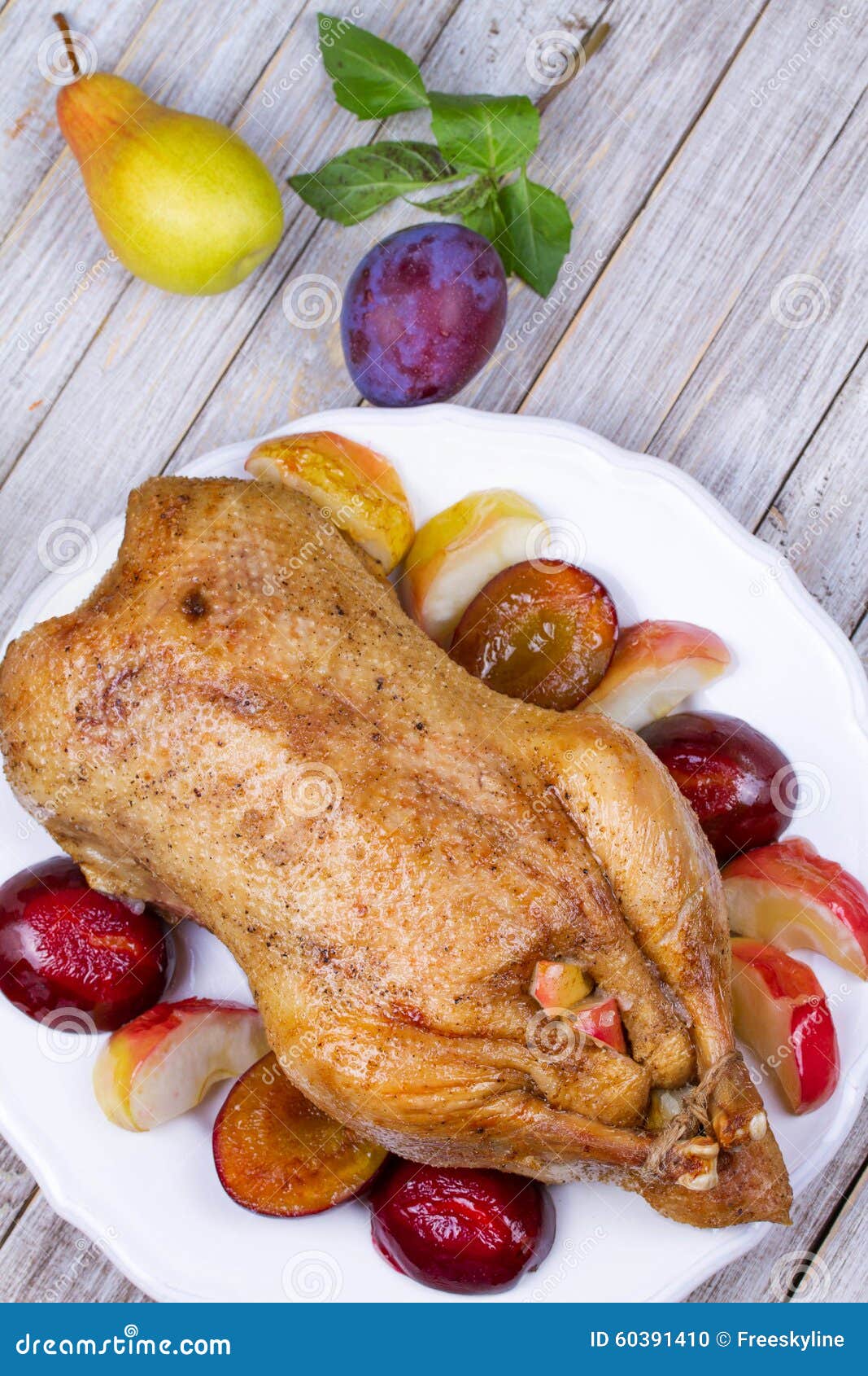 Roast Duck with Plums and Apples. Stock Photo - Image of dark, chicken ...
