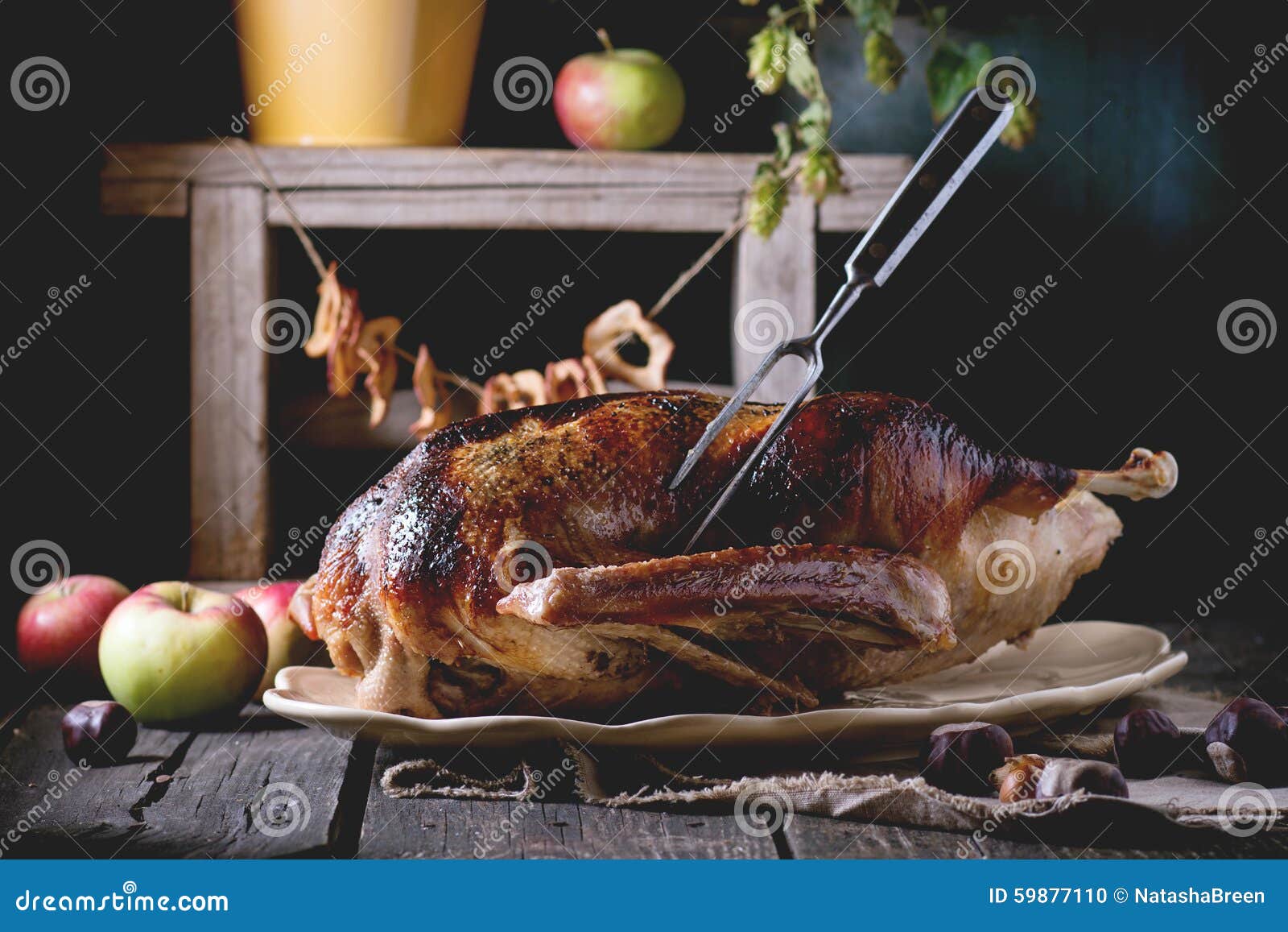 Roast goose with apples stock photo. Image of dinner - 59877110
