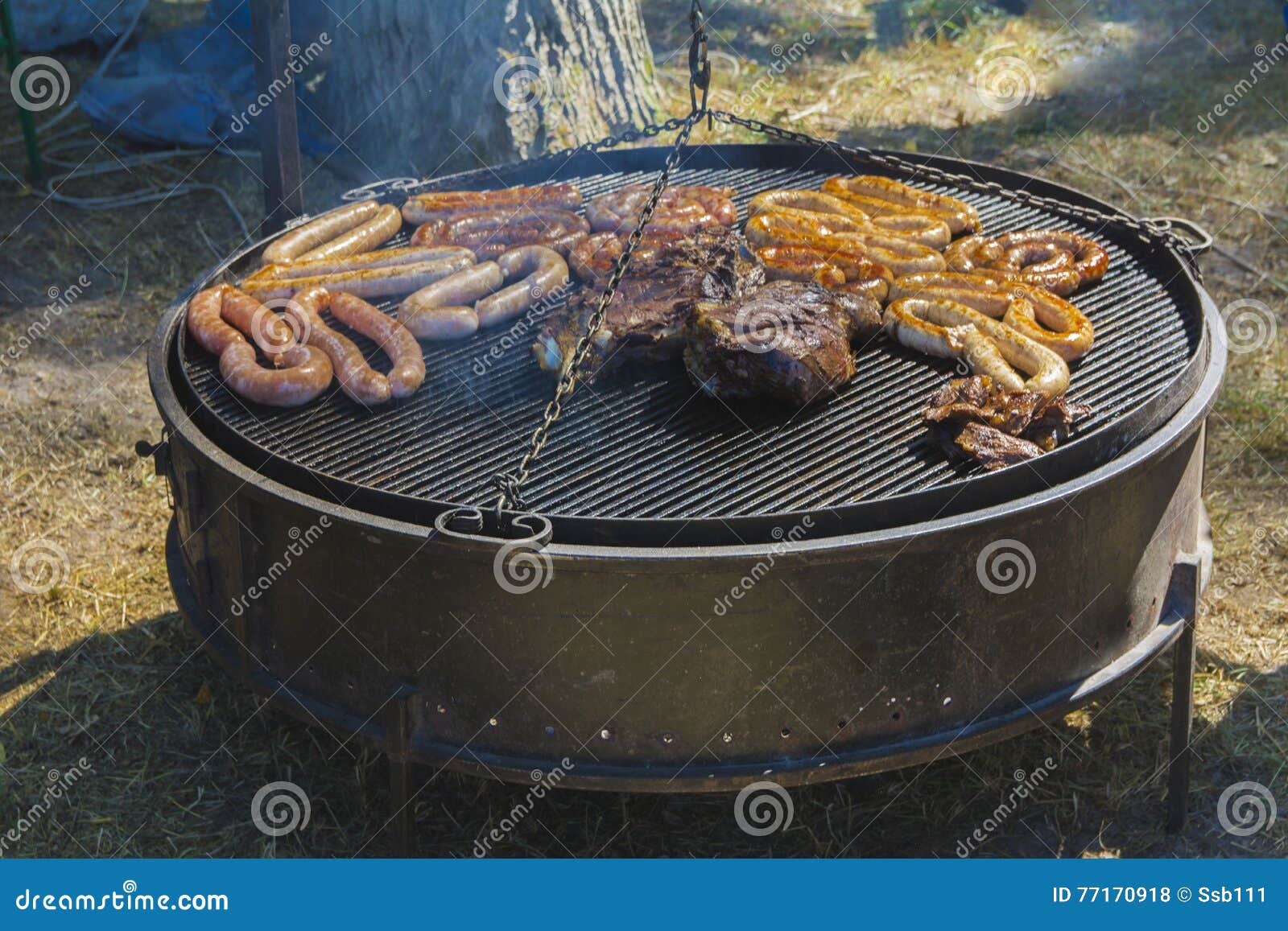 Roast Large Chunks of Meat and Sausage Stock Photo - Image of fire ...