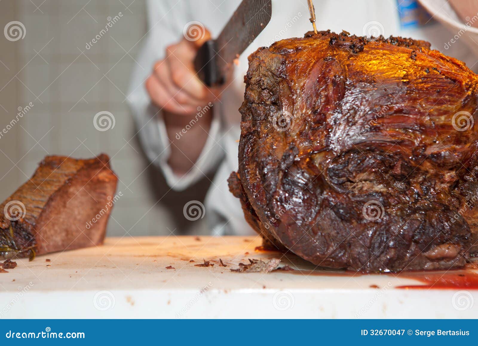 Roast meat is being carved stock image. Image of cutting - 32670047