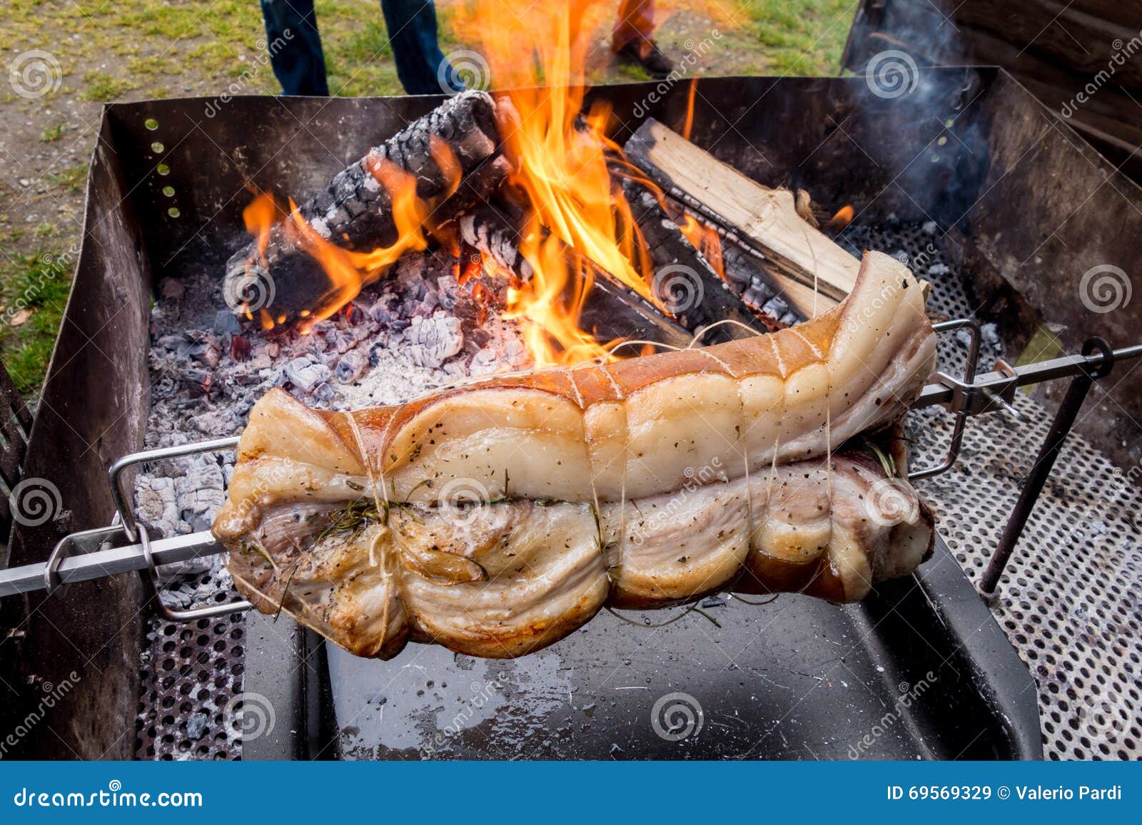 Roast pig on a spit stock image. Image of meal, cooking - 69569329