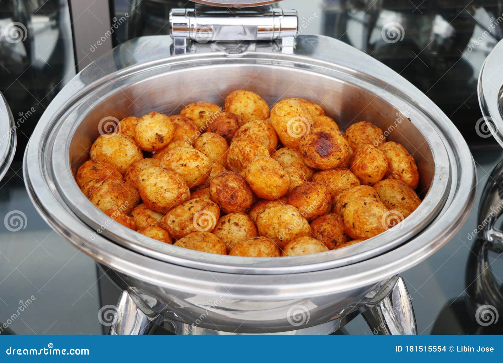 Roast Potatoes in a Chafing Dish Buffet Stock Photo - Image of rosemary ...