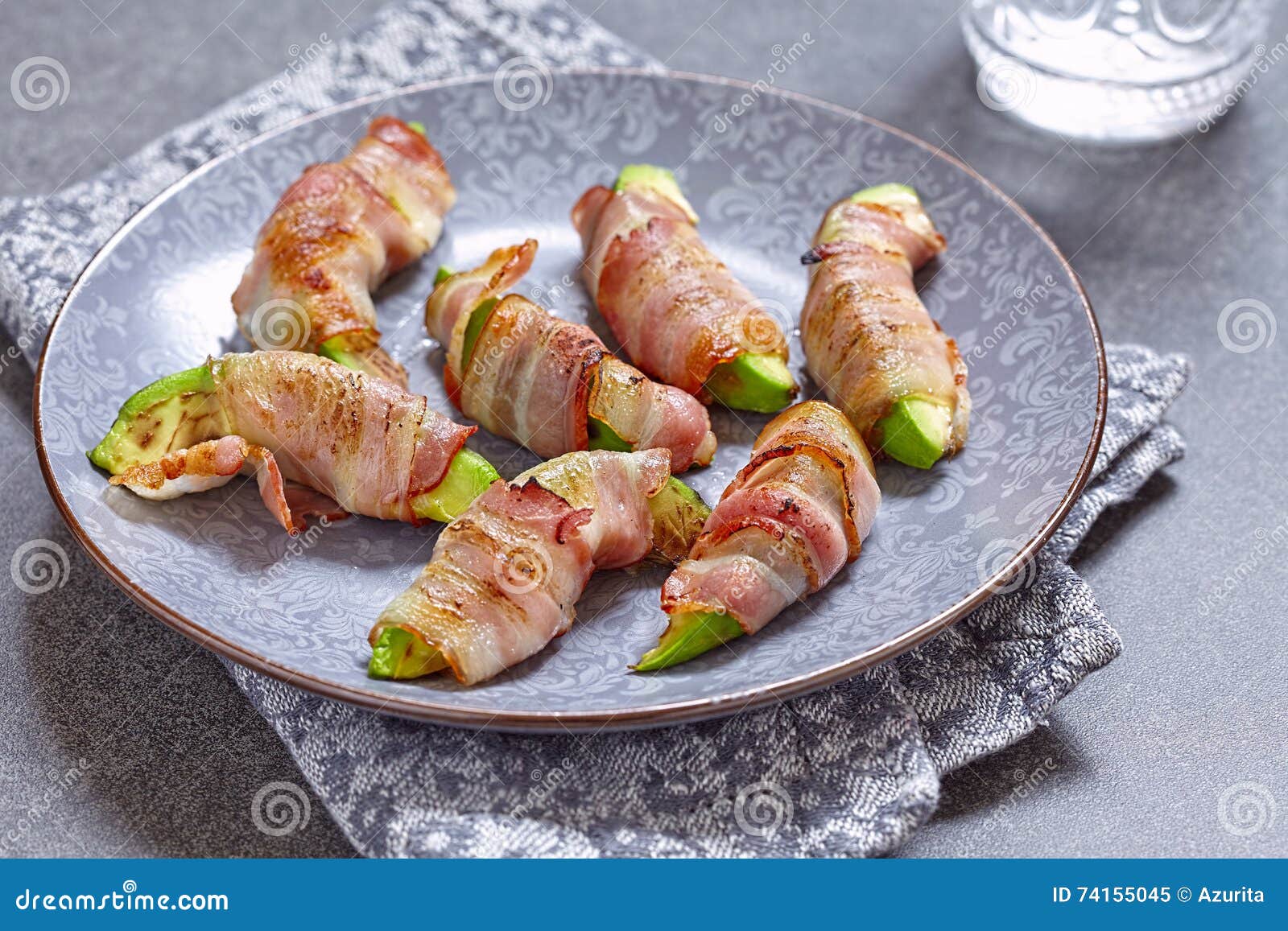 Roasted Avocado Pieces Wrapped in Bacon Stock Image - Image of carb ...