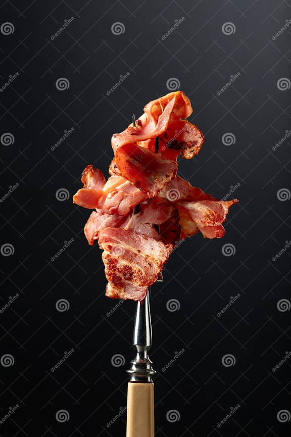 Roasted bacon on a fork stock image. Image of grilled - 297370963