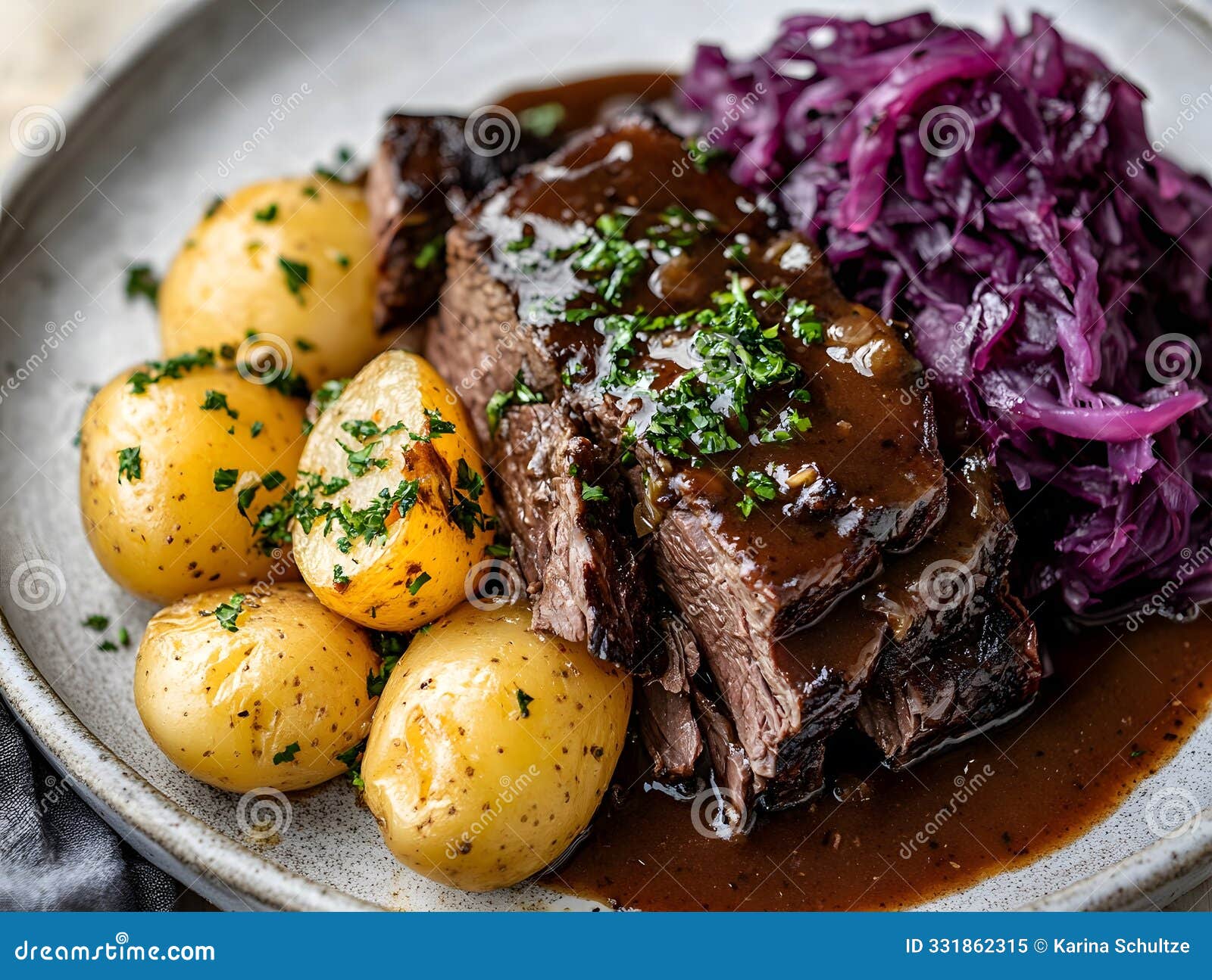 Roasted Beef Tenderloin with Red Cabbage and Roasted Potatoes Stock ...