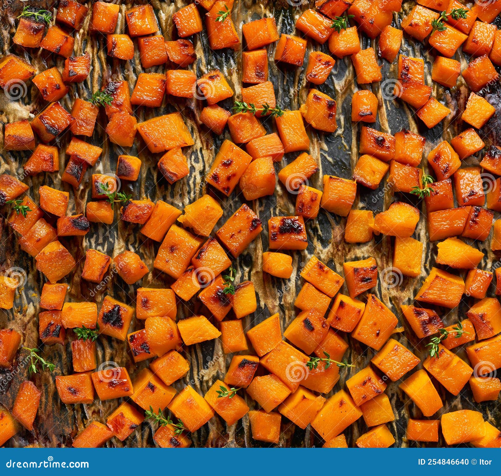 Roasted Butternut Squash Cubes with Thyme, Top View Stock Photo - Image ...