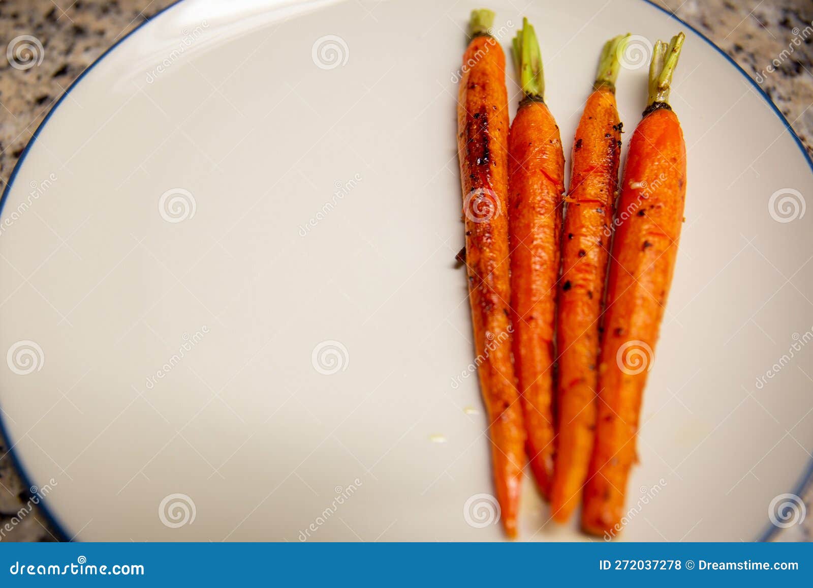 Roasted Carrots on a Plate stock photo. Image of vegetable - 272037278