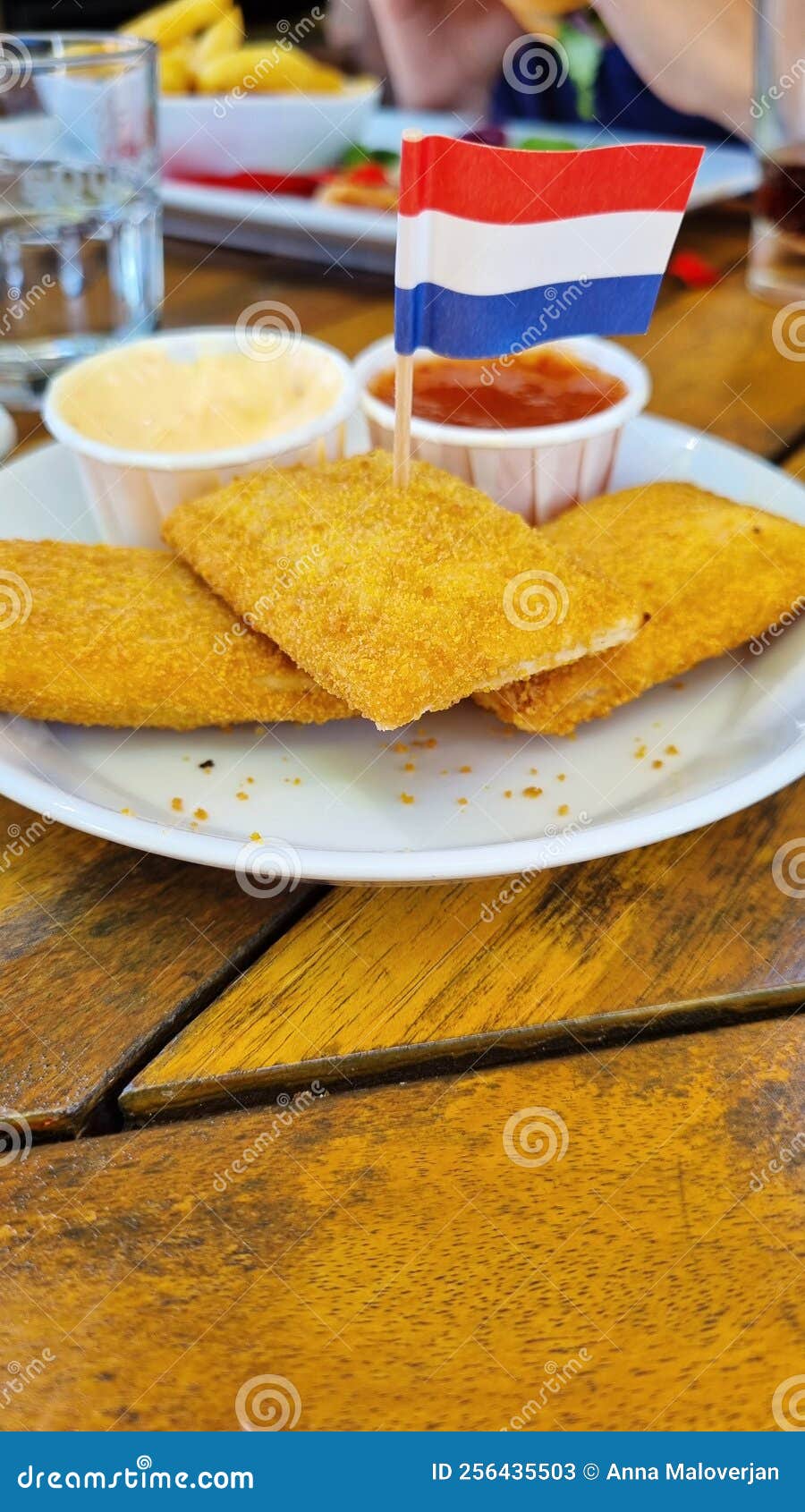 Roasted Cheese Sticks on a Plate with Netherlands Flag Stock Image ...