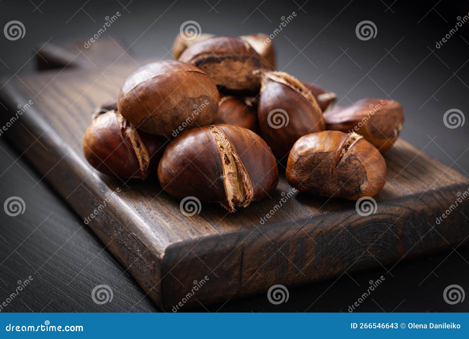 Roasted Chestnuts on Dark Wooden Background Stock Image - Image of ...