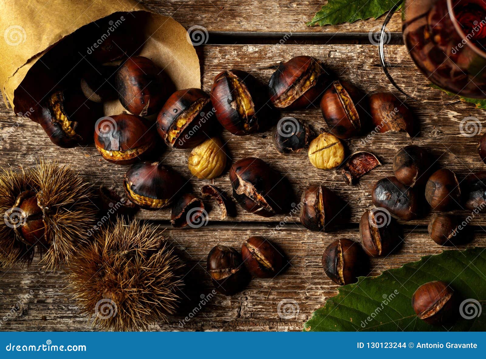 Roasted Chestnuts in Paper Cone. Stock Photo - Image of organic, fire ...